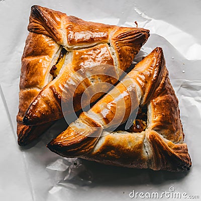 Three Golden Brown Triangular Pastries On White Surface, Inviting With ...
