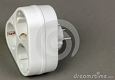 Three-prong Socket Adapter With Grounding On A Gray Background Royalty ...