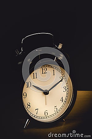 Time Is Up - Alarm Clock Standing Isolated On Black Background. With ...