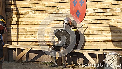 Tired Knight Resting In The Bench After The Battle Stock Video - Video ...