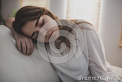 Tired Woman Falling Asleep On The Couch Stock Photo - Image: 66423606