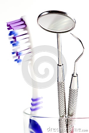 Toothbrush And Dental Mirror - Explorer In Glass Royalty-Free Stock ...
