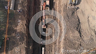 Top Down Aerial Above Construction Site with Workers and Excavator ...