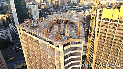 Top of High Tower Building with Workers on Construction Site. Big City ...