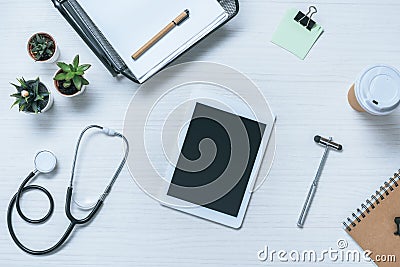 Top View Of Digital Tablet With Blank Screen Stethoscope Reflex Hammer ...