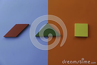 Top View Of Shapes Of Red Parallelogram, Green Triangle And Yellow ...