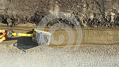 Top View Worker Compacting Foundation Using Vibration Plate Compactor ...