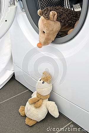 Toy Hedgehog In Washing Machine With Duck Royalty-Free Stock Photo ...