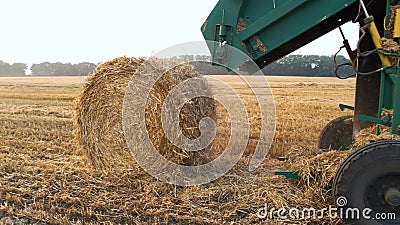 Tractor making hay bales. stock footage. Video of country - 122391256
