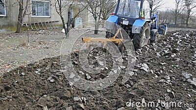 Tractor Plowing the Soil in the Garden Stock Video - Video of autumn ...