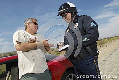 Traffic Cop Writing A Ticket Royalty Free Stock Photos - Image: 29660068
