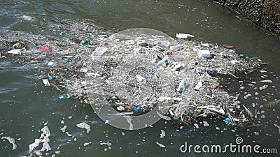 Trash and Garbage Floating on the Surface of the Water. Stock Footage ...