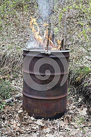Trash And Garbage In Old Rusty Burning Barrel Stock Images - Image ...