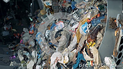 Trash Sorting for Recycling and Disposing. Plastic Garbage Rotates in a ...