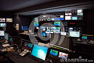 TV Broadcast News Studio With Many Computer Screens And Control Panels ...