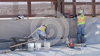 Two Construction Workers Finish Concrete Work Stock Video - Video of ...