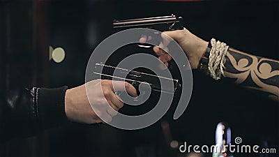 Two Male Hands with Guns Take Aim at Each Other. Close Up Stock Video ...
