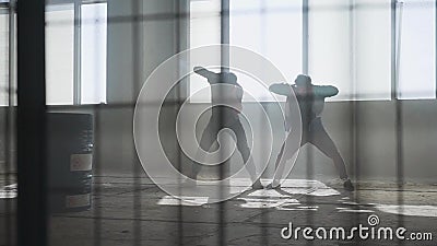 Two Man Street Dancing in Front of the Large Window in Abandoned ...