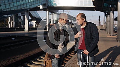 Two Men on the Platform of the Railway Station Waiting for the Arrival ...