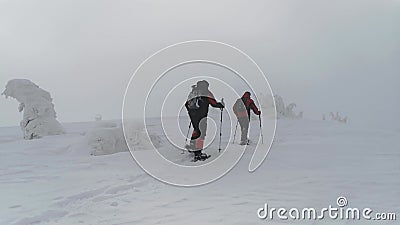 Two Men are Walking Up a Slope on a Winter Hike Stock Footage - Video ...