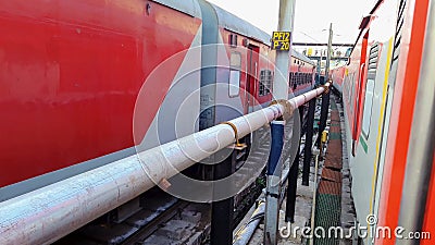 Two Passenger Train Standing at Railway Station Platform with Water ...