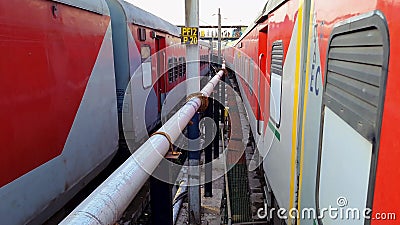 Two Passenger Train Standing at Railway Station Platform with Water ...