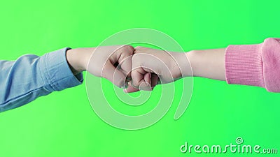 Two Women Fist Bumping Against White Screen. Stock Footage - Video of ...