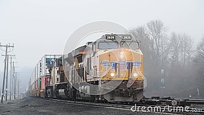 Union Pacific Container Train in the Mist Approaching Stock Footage ...