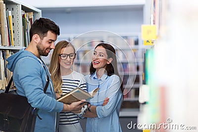 Students Working In The Library At Campus Stock Photo | CartoonDealer ...
