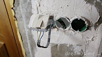 An Unsafe Electrical Switch Hangs on Wires. Electrical Safety Stock ...