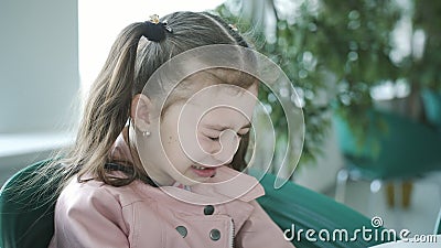 Little Girl Crying at a Table in a Cafe by the Window. Stock Video ...