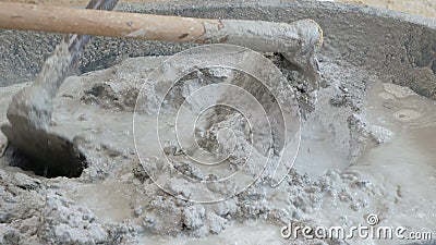 Use Hoe Mixing Mortar with Water for Construction Stock Footage - Video ...