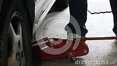 Jacking Up a Car in a Garage 2 Stock Video - Video of mechanical ...