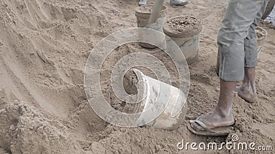 Using a Shovel To Put Sand into a Bucket Stock Footage - Video of ...