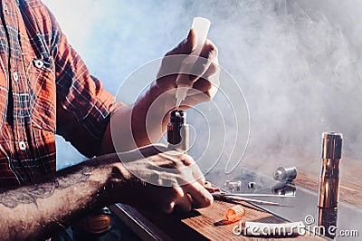 The Process Of Servicing The Mechanical Vape Device. Master Replace ...