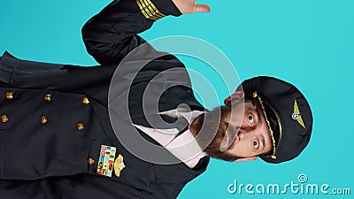 Vertical Video: Airline Pilot Pointing To Left or Right Sides on Camera ...