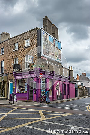 Vertical View Of Dublin City Street Side Buildings With Shops Under The ...