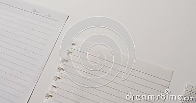 Video of Close Up of Four Sheets of Notebook Paper on White Background ...