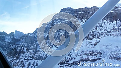 Video of Flying Over Snow Covered Mountains in Private Airplane Stock ...