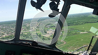 View from Inside of Helicopter Cockpit of Meadows and Fields. View from ...