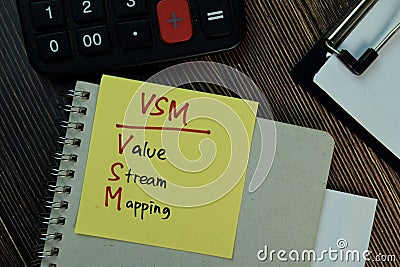 VSM - Value Stream Mapping Write On Sticky Notes Isolated On Wooden ...