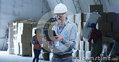 Warehouse Supervisor Checking On The Work Progress Stock Video - Video ...