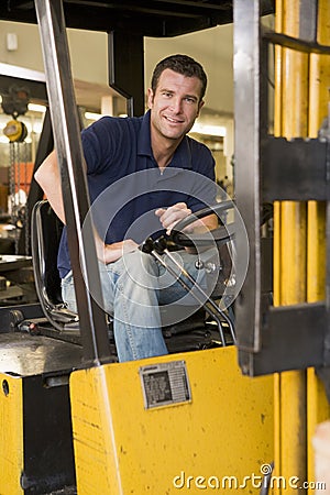 Warehouse Worker Standing by Forklift Stock Photo - Image of caucasian ...