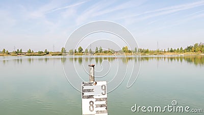 Water Depth Measuring Stick in a Lake Stock Video - Video of water ...