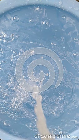 Water flow in the bucket stock footage. Video of waterfall - 153906196