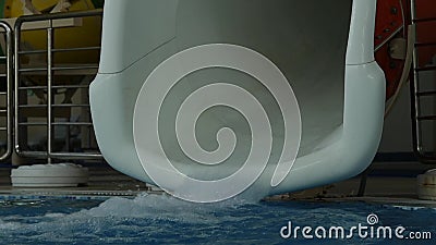 Water Flows Out of Pipe in Water Park. Water Slides in Amusement Park ...