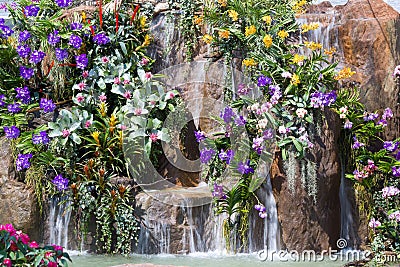 Waterfall And Flowers In Garden Royalty Free Stock Photos - Image: 35062968