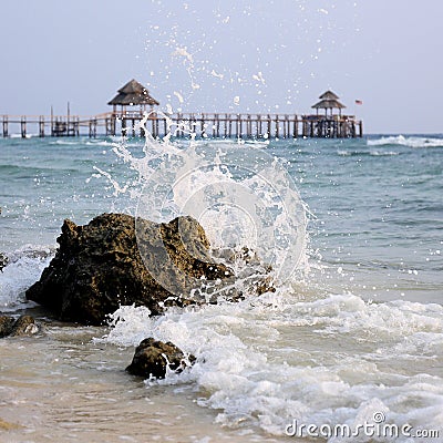 Wave Hitting Rock Royalty-Free Stock Photo | CartoonDealer.com #53025801