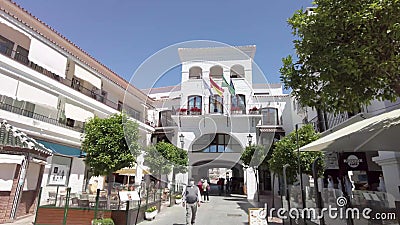 White Building with Flags on the Roof in Nerja Stock Footage - Video of ...