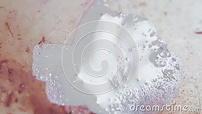 Light Reflections in Grey Paint Puddle on White Plastic Dirty Palette ...